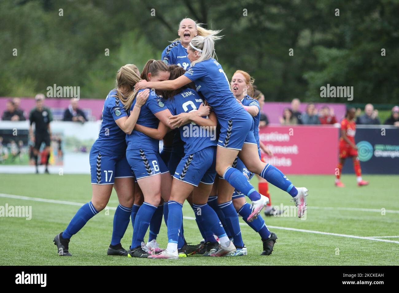 Lauren Briggs of Durham celebrates with teammates after scoring during ...