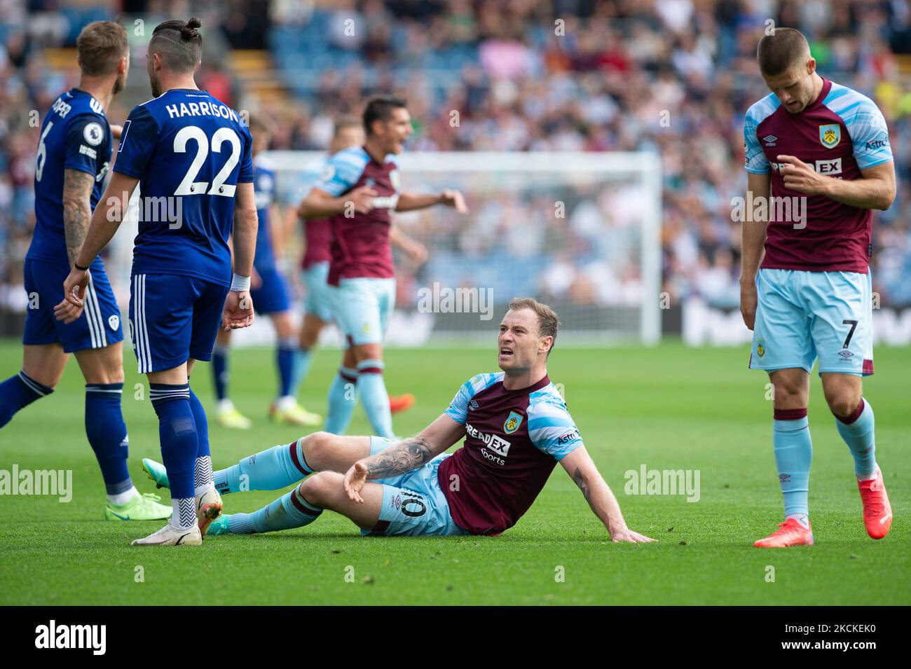 Jack Harrison of Leeds United fouls Ashley Barnes of Burnley during the ...