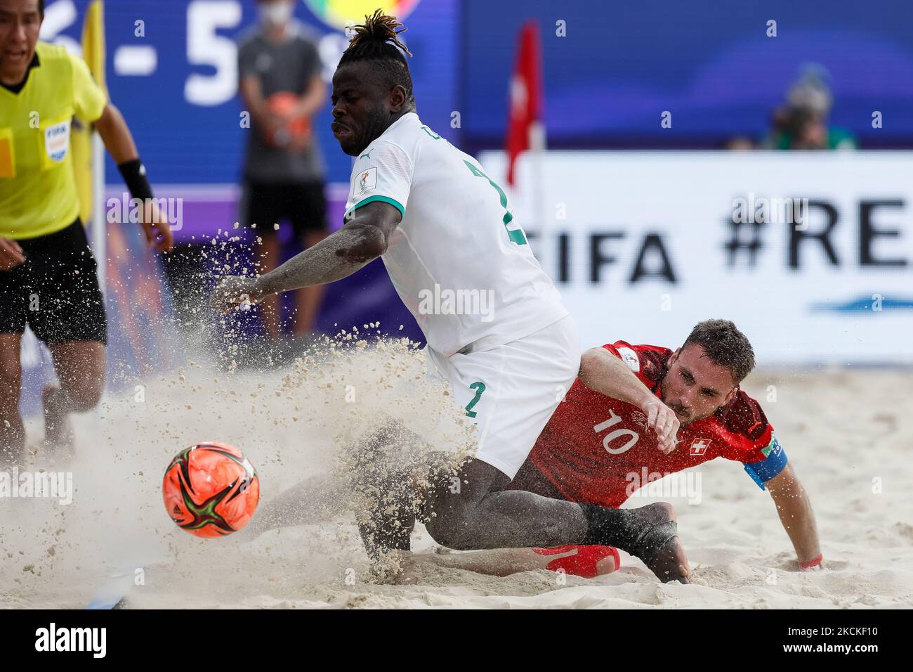 Noel Ott (R) of Switzerland and Ninou Diatta of Senegal vie for the ...