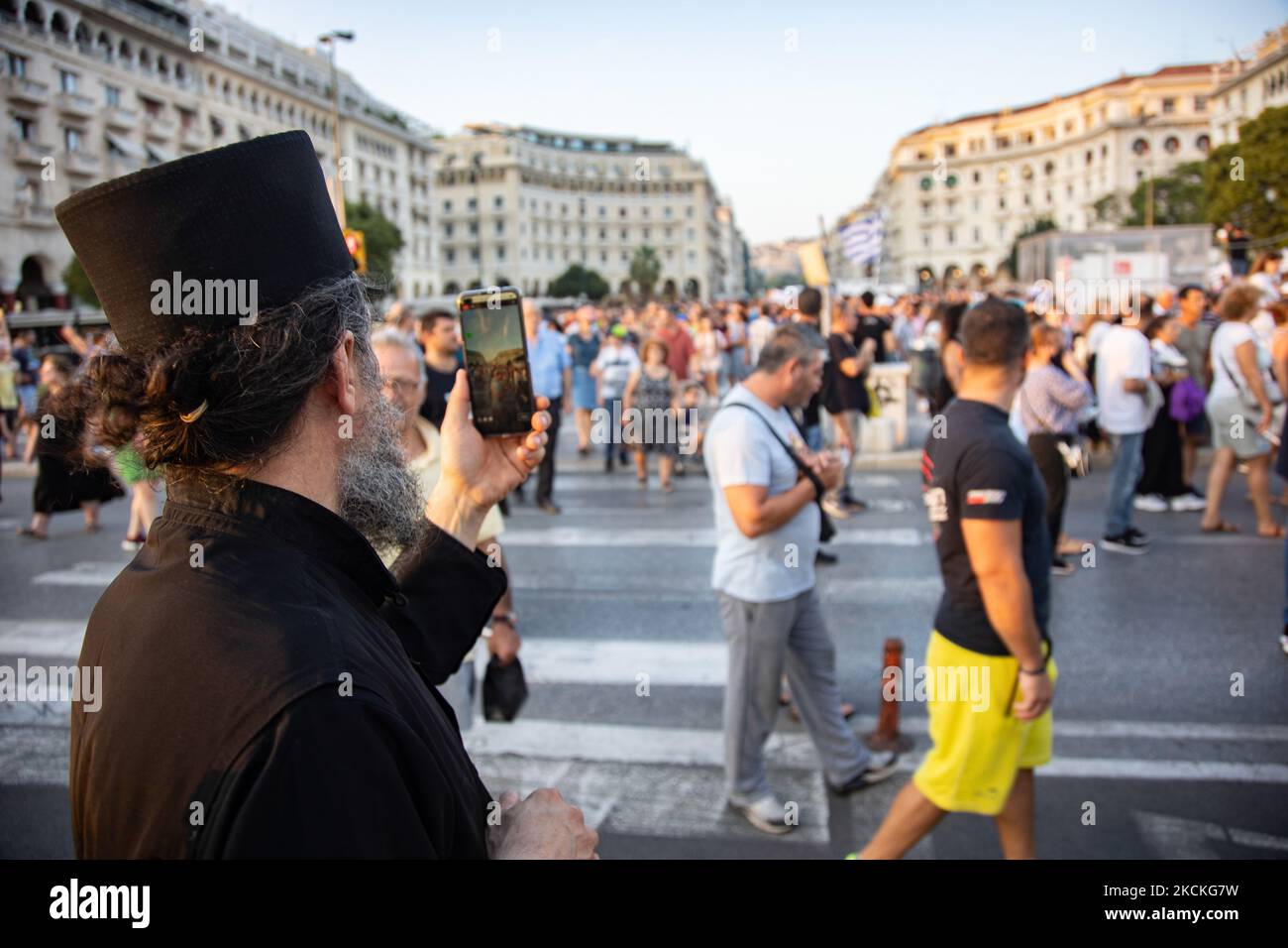 A priest is live streaming the protest. Hundreds of protesters with ...
