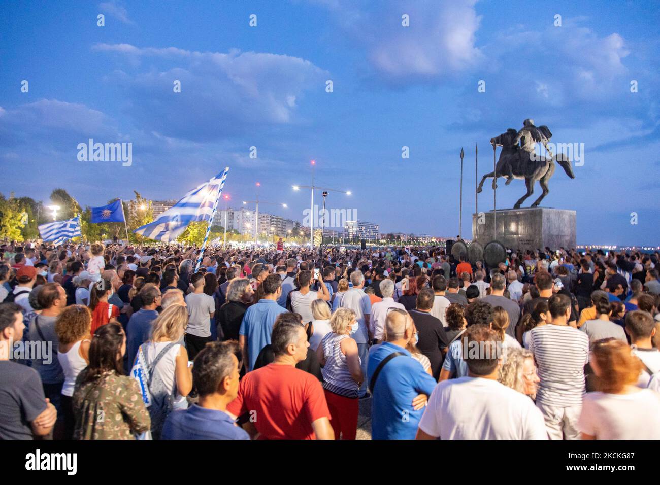 A priest is talking in front of thousands of people against the ...