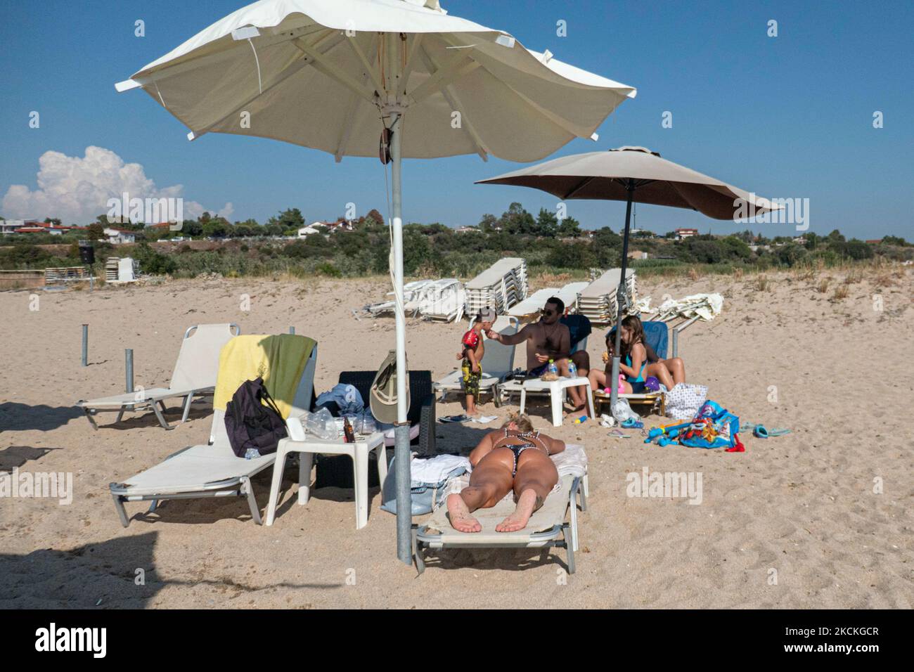 Greece beach bikini family hi-res stock photography and images - Alamy