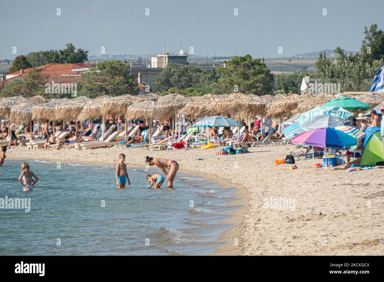 Greece beach bikini family hi-res stock photography and images - Alamy