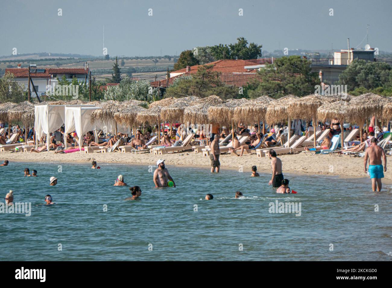 Greece beach bikini family hi-res stock photography and images - Alamy