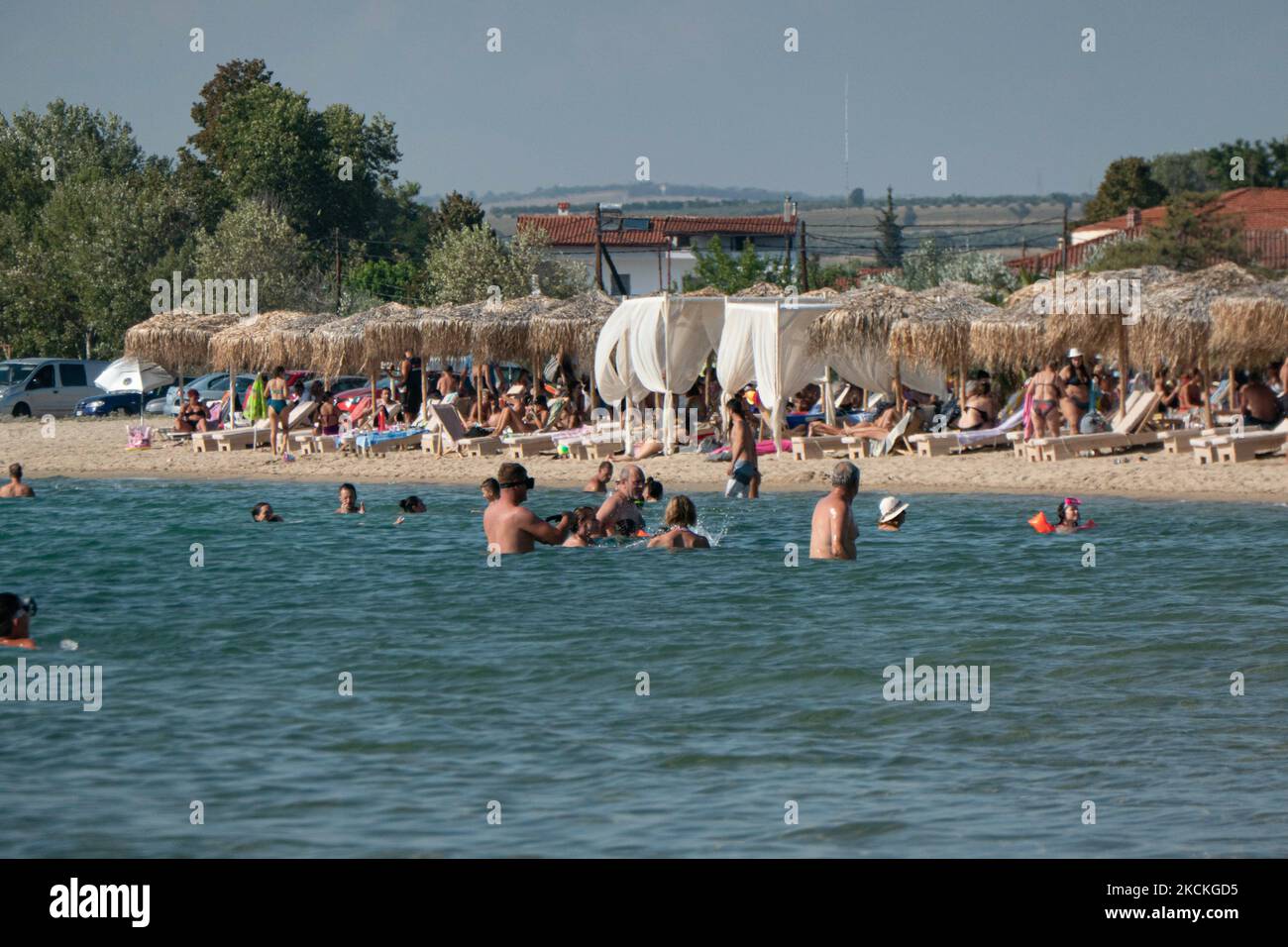 Daily life at the beach with tourists, mainly from the Balkans and ...