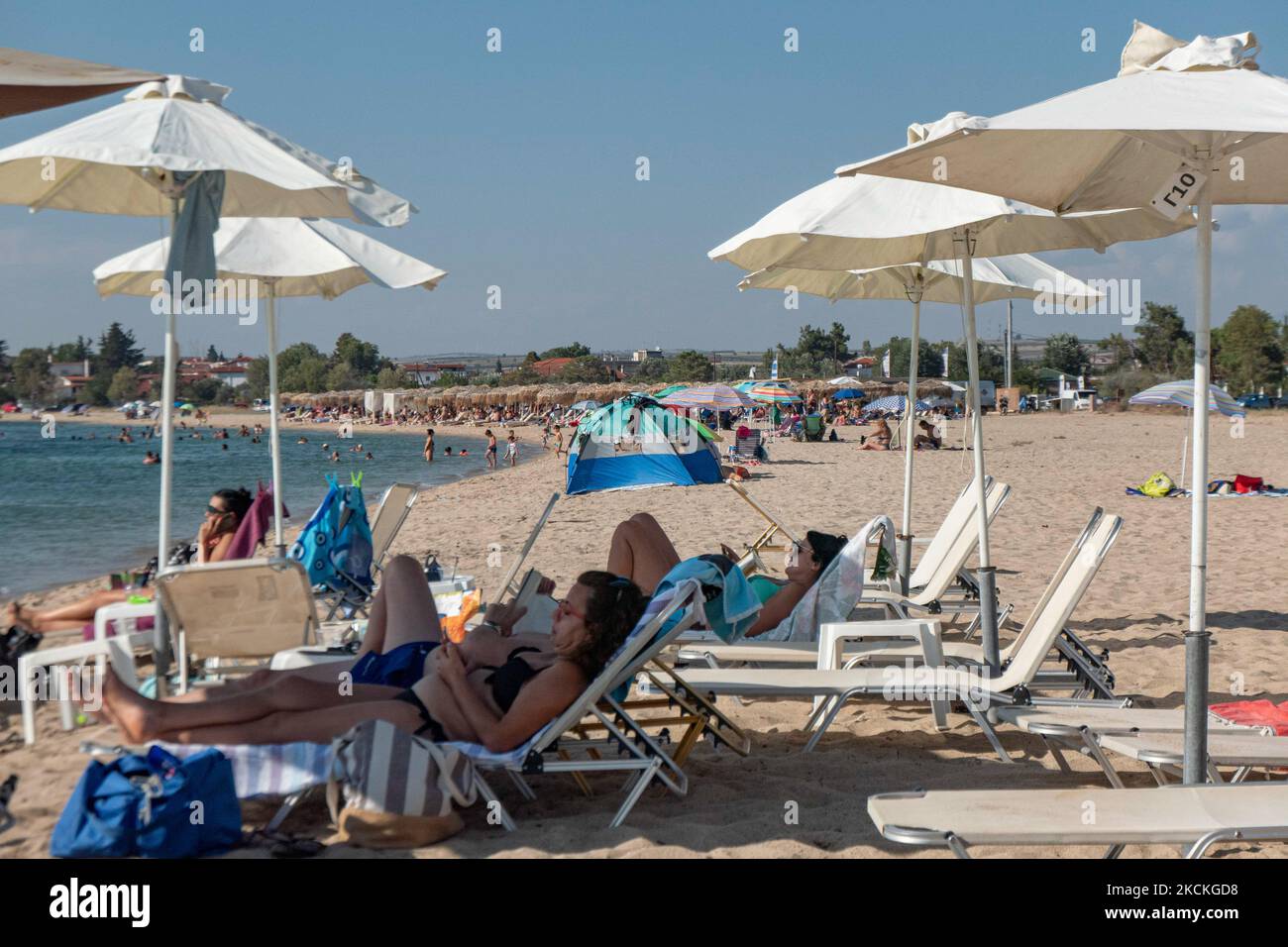 Daily life at the beach with tourists, mainly from the Balkans and ...