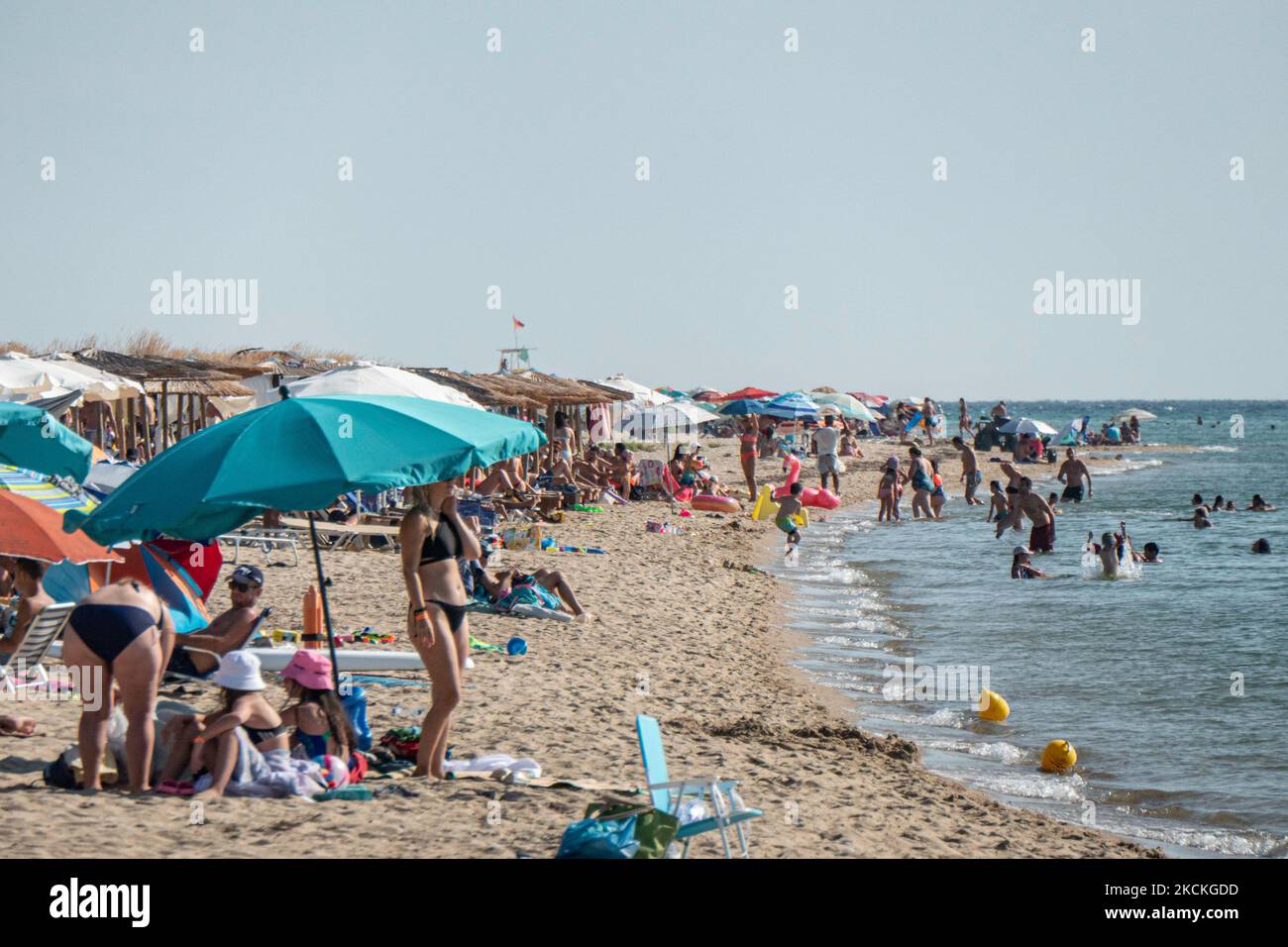 Daily life at the beach with tourists, mainly from the Balkans and ...