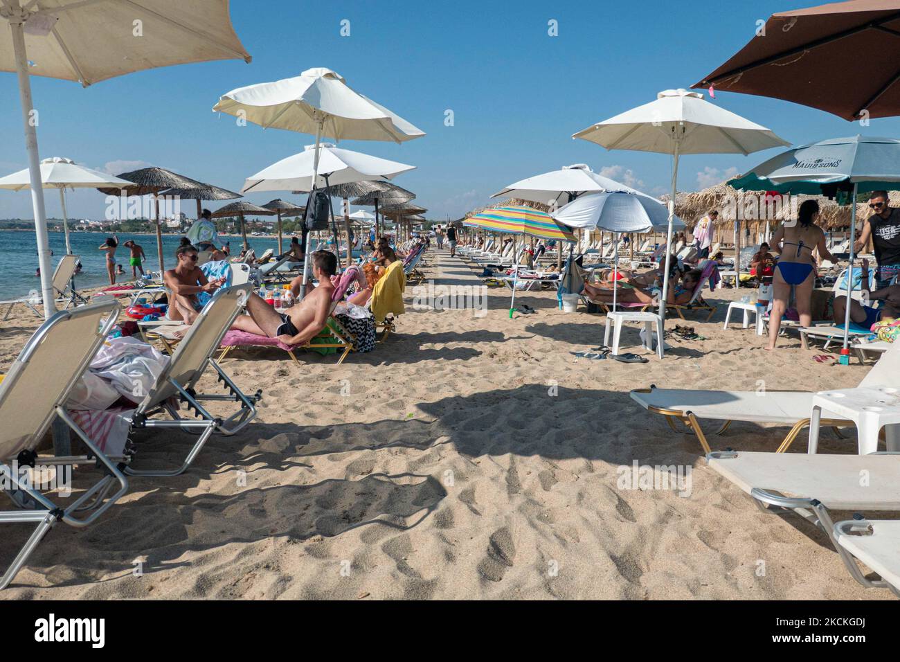 Daily life at the beach with tourists, mainly from the Balkans and ...