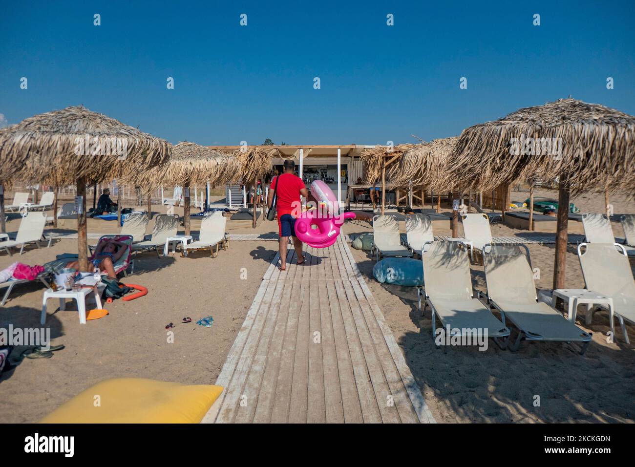 Daily life at the beach with tourists, mainly from the Balkans and ...