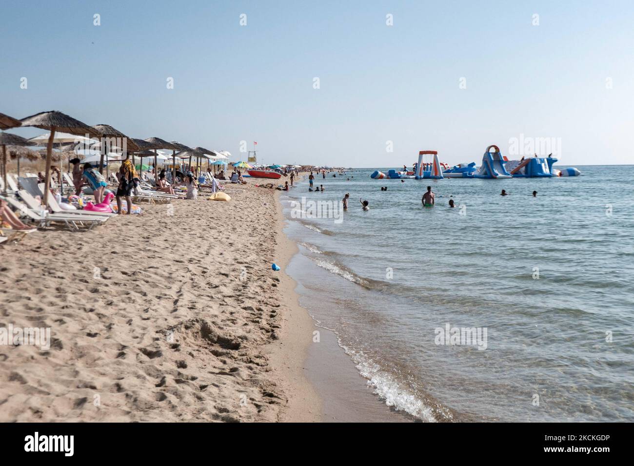 Daily life at the beach with tourists, mainly from the Balkans and ...