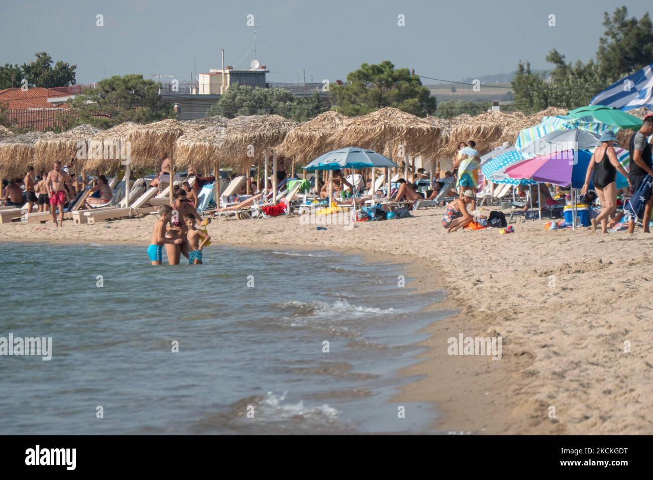 Daily life at the beach with tourists, mainly from the Balkans and ...