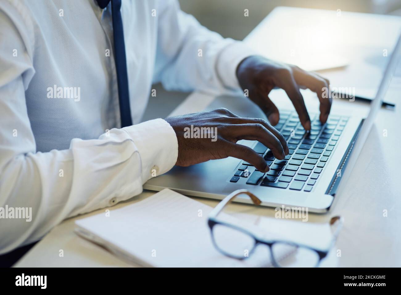 Working hard to gain a competitive advantage. an unrecognisable ...