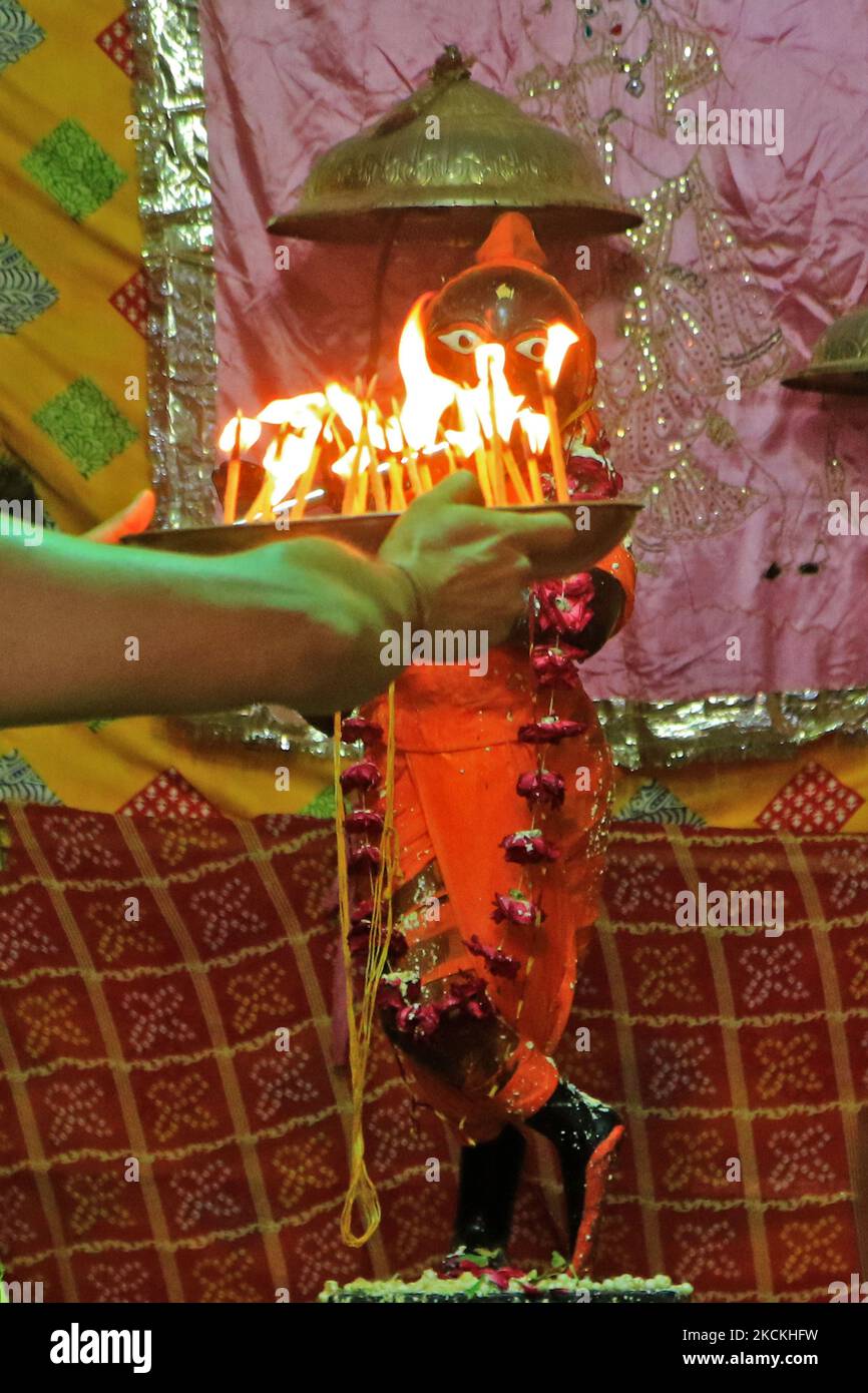 A priest perform worship to Lord Krishna on the occasion of ' Krishna ...
