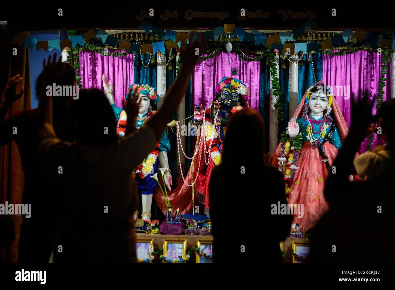 Devotees perform offerings during the 'Janmashtami' festival to ...