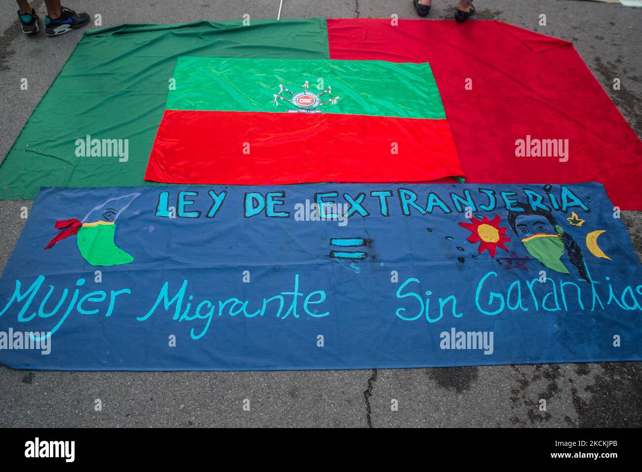 Flag of the Indigenous Regional Council of Cauca is seen next to a ...