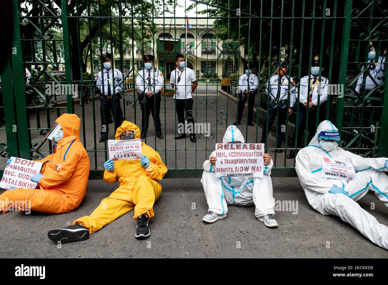 Filipino health workers calling for the release of the benefits and ...
