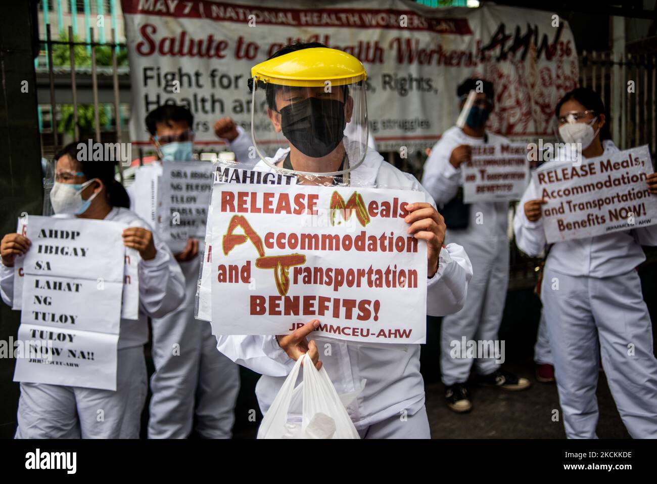 Filipino health workers calling for the release of the benefits and ...