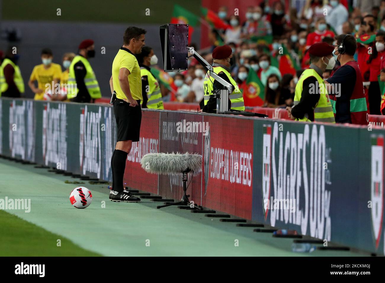Referee Matej Jug of Slovenia checks the VAR during the FIFA World Cup 2022 European qualifying ...