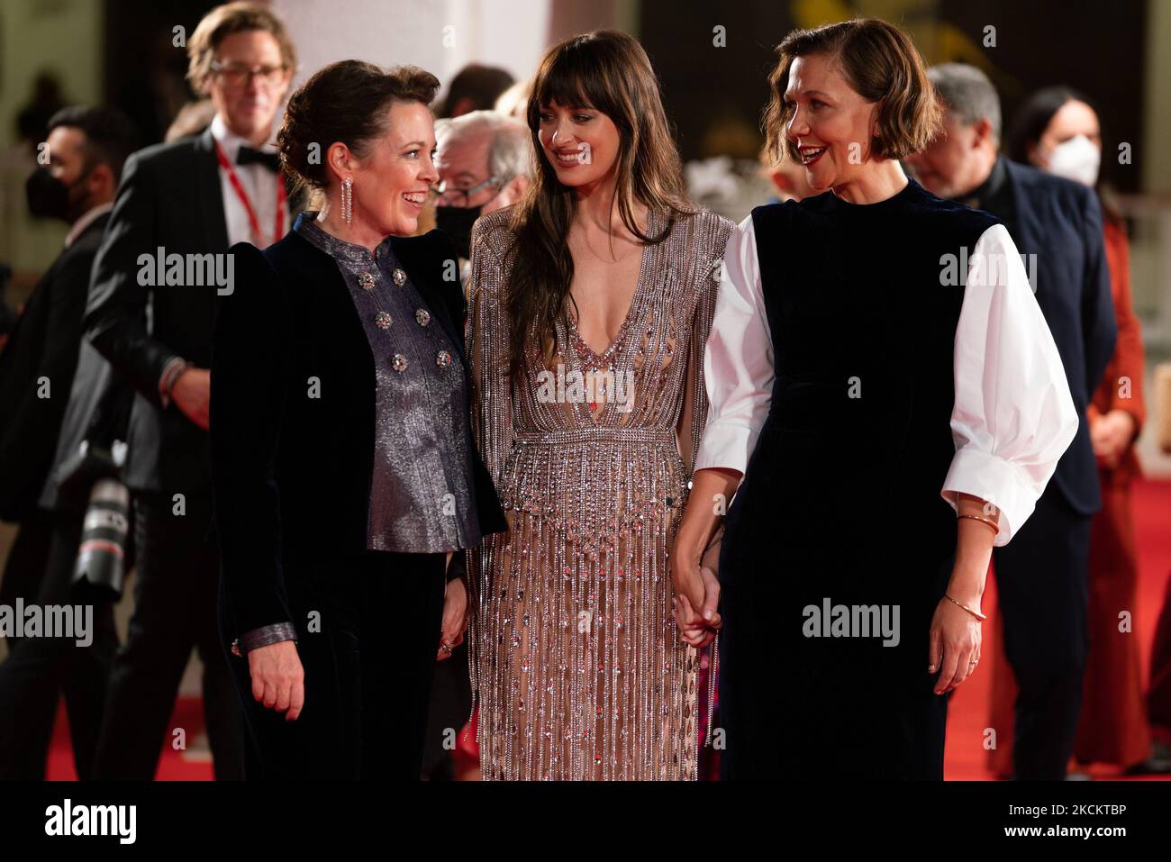 Olivia Colman, Dakota Johnson and director Maggie Gyllenhaal attend the ...