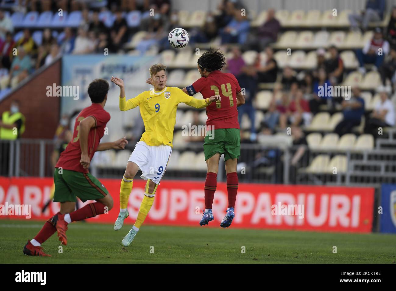 Luca Andronache and Tomas Esteves in action during the friendly game ...
