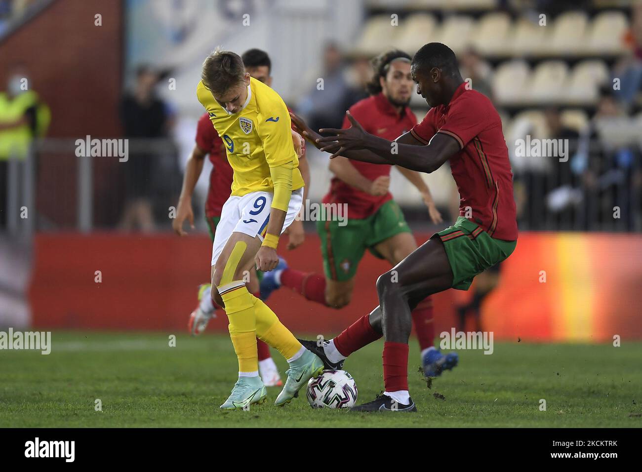 Luca Andronache and Rafael Fernandes in action during the friendly game ...