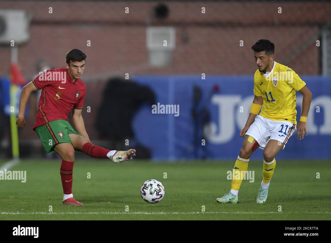 Rafael Fernandes and Robert Mustaca in action during the friendly game ...