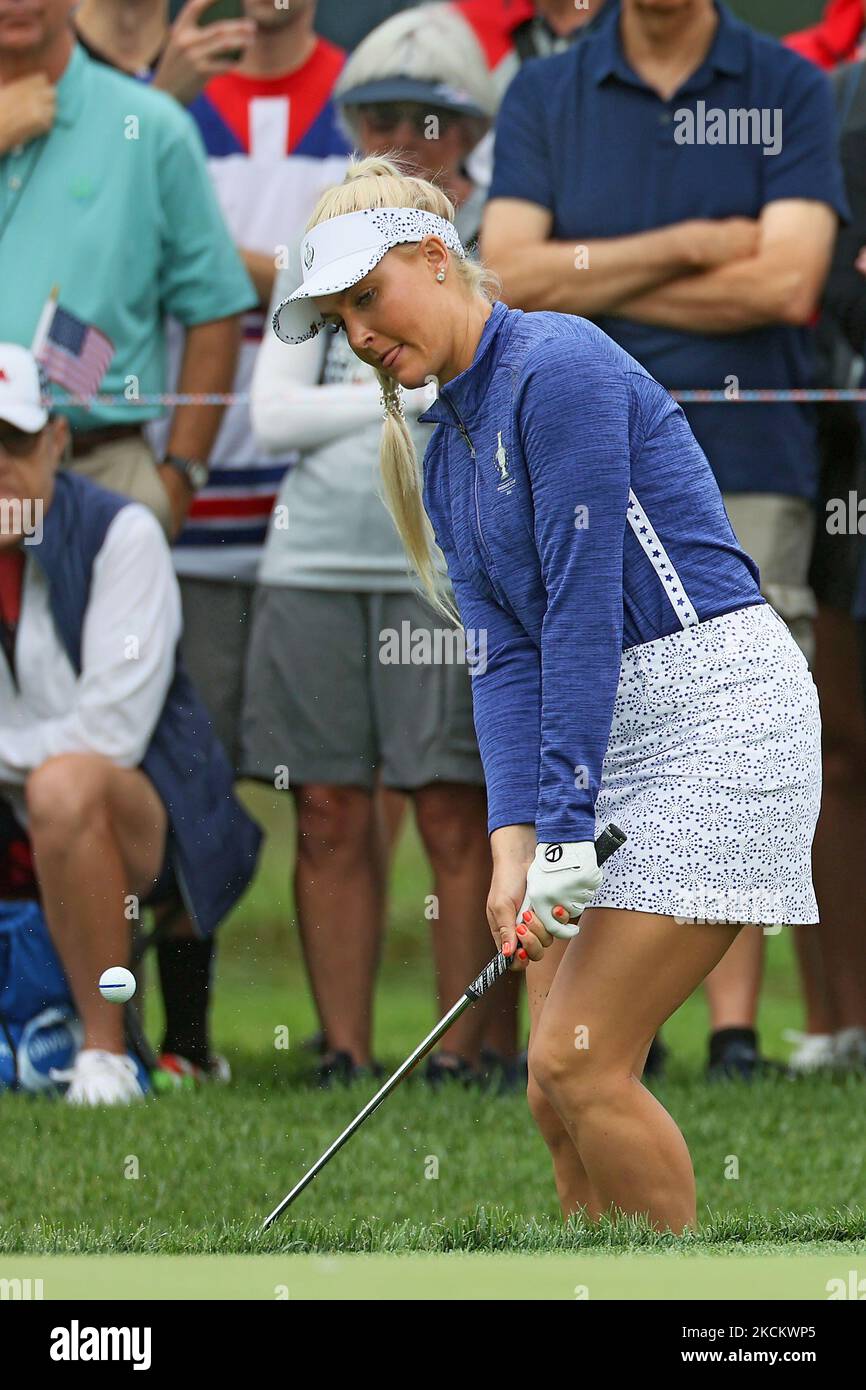 Charley Hull of Team Europe chips onto the seventh green during the ...
