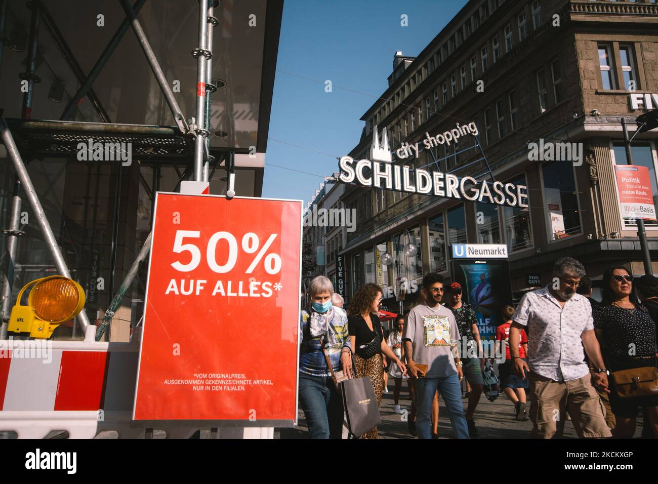 50 percent reduced sign is seen at city center of Cologne, Germany on ...