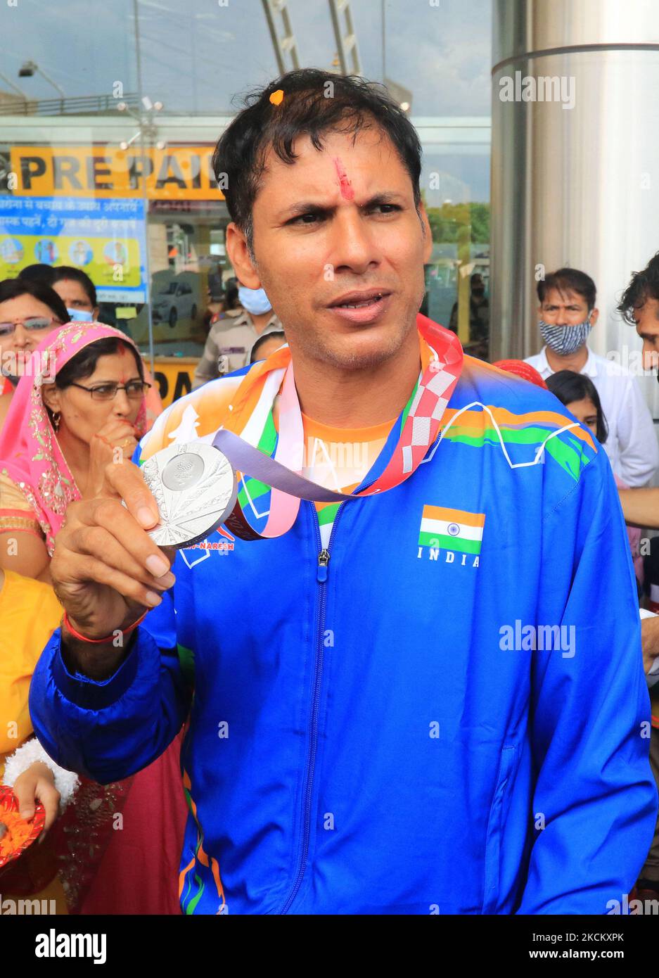 Javelin thrower Devendra Jhajharia shows his Silver medal after winning ...