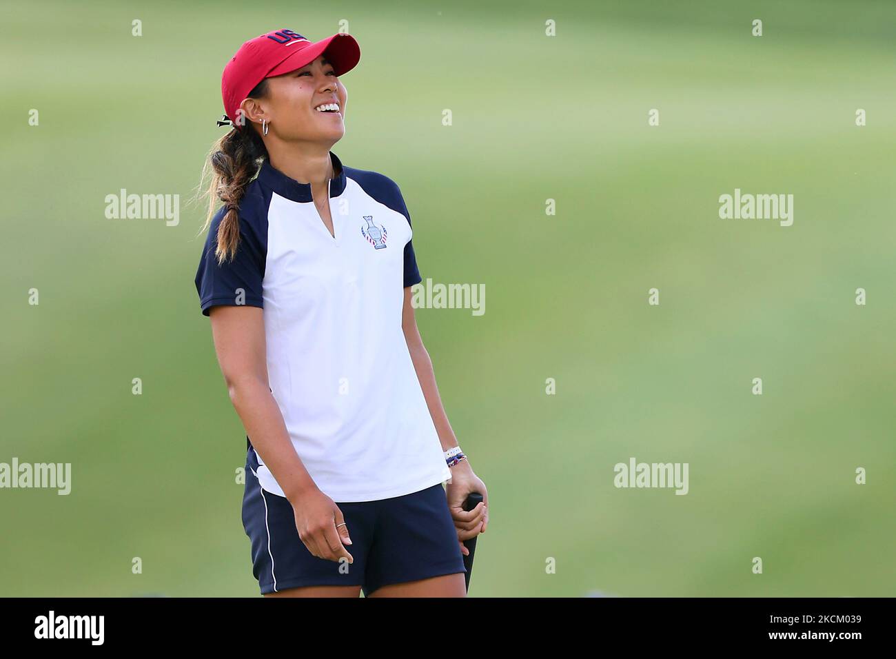 Danielle Kang of Team USA reacts after her putt on the 9th green during ...