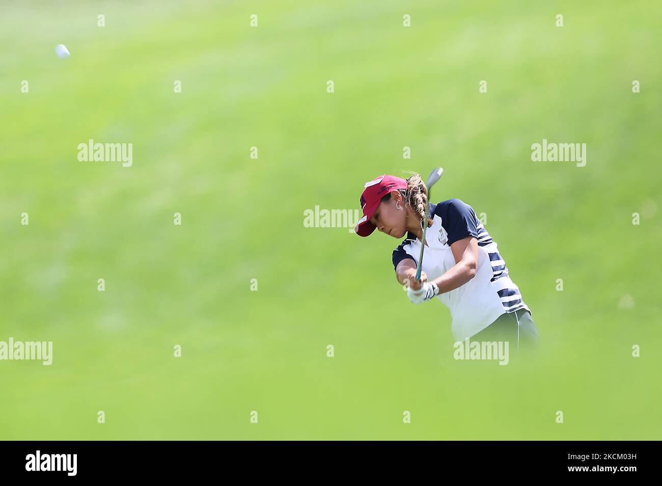 Danielle Kang of Team USA hits from the fairway to the 8th green during ...