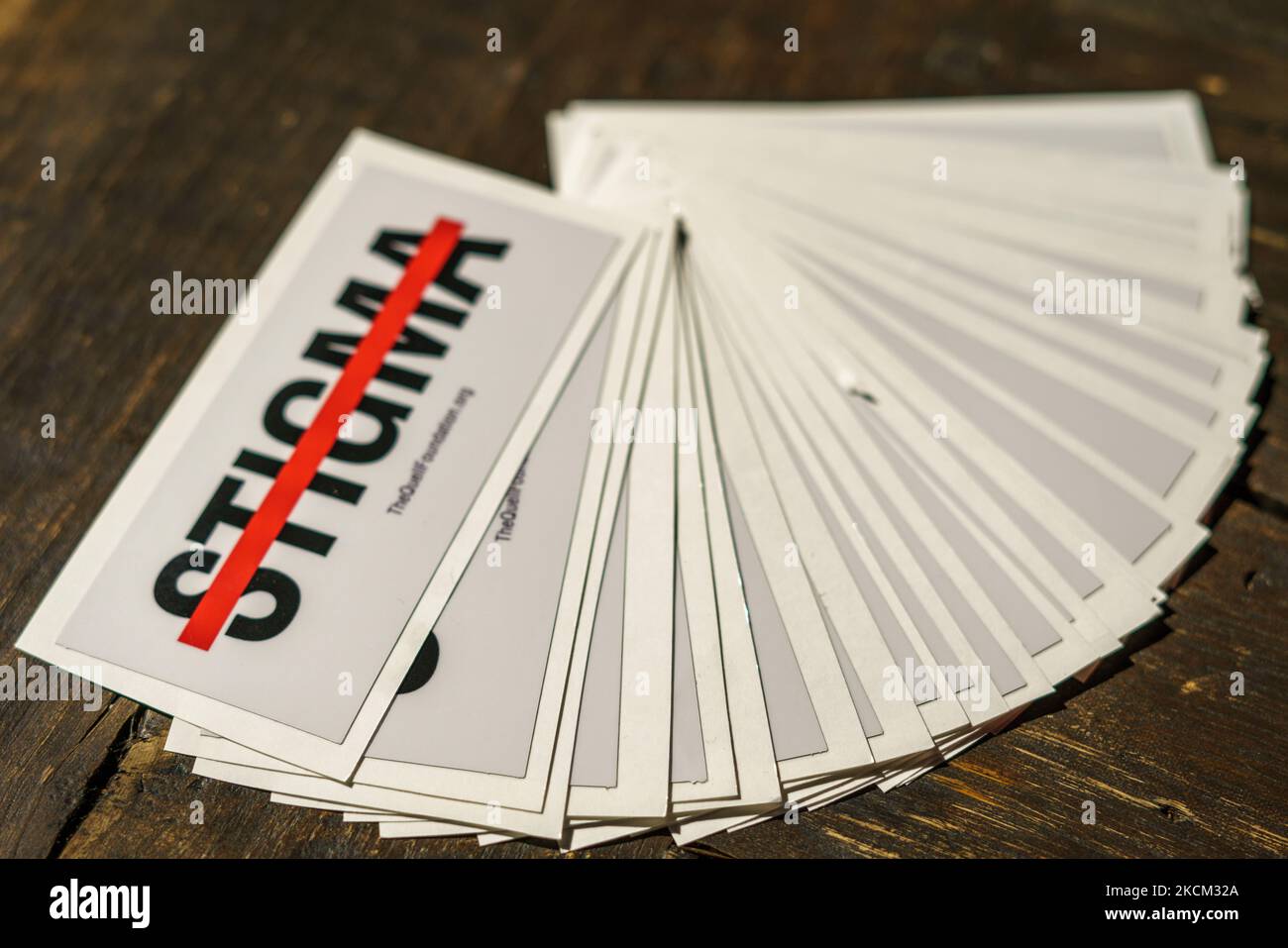 Stigma stickers are seen as cyclists of the Quell Foundation prepare to ...