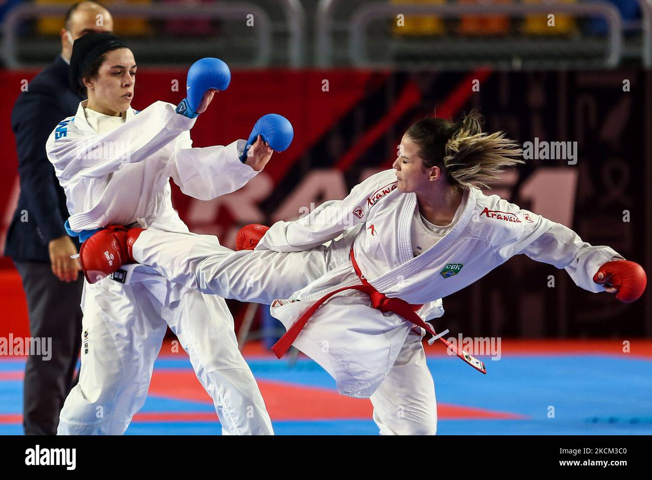 CAROLAINI ZEFINO PEREIRA (Red) of Team BRAZIL competes against NOURSIN ...