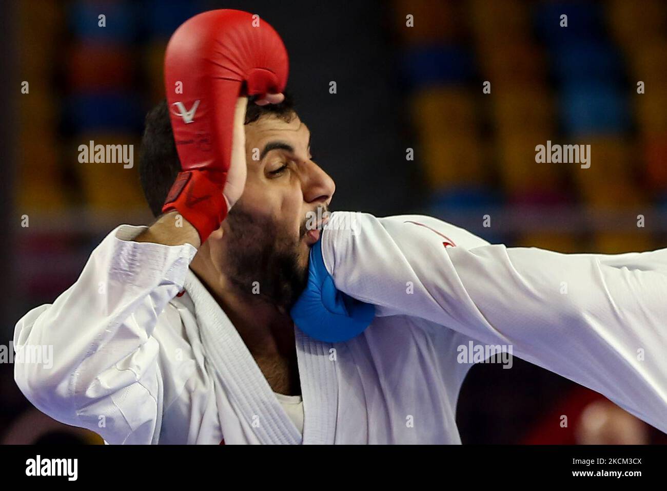 HAZEM AHMED MOHAMED (Red) of Team Egypt during the Men's Karate Kumite ...