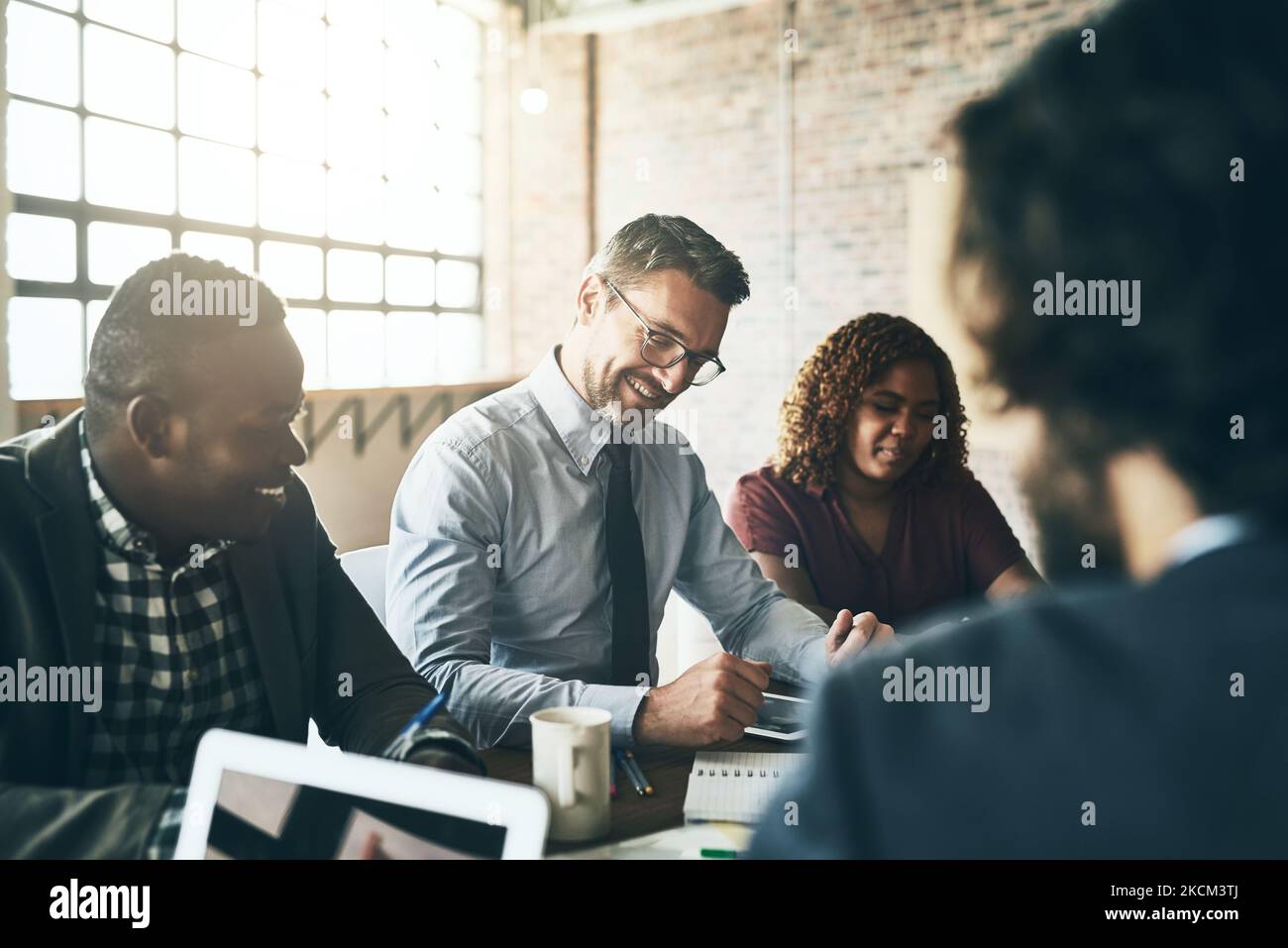 Group around office table hi-res stock photography and images - Alamy