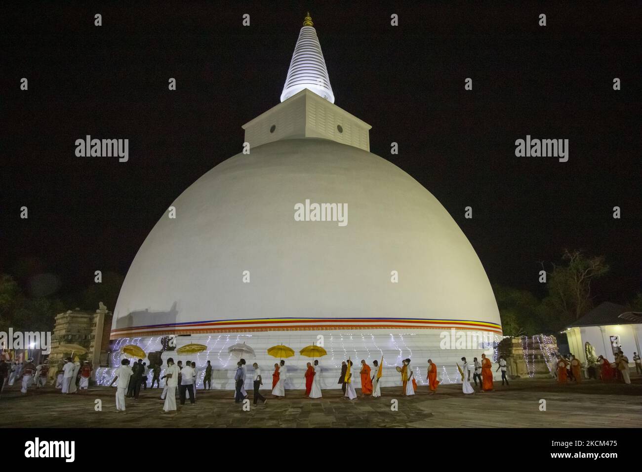 Sri Lankan Buddhist monks wearing face masks arrive at the Mirisawetiya ...