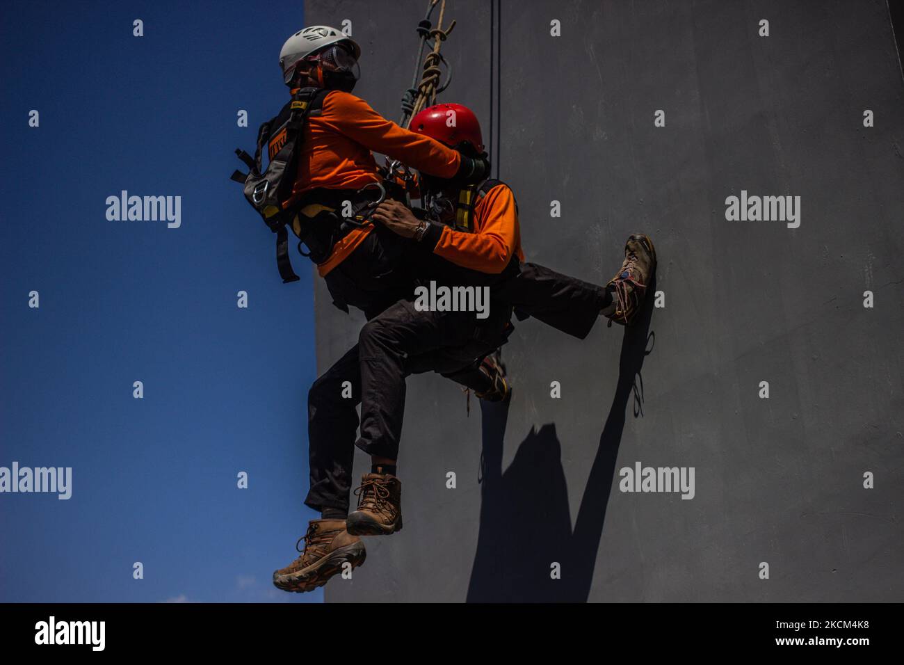 Personel of National Search and Rescue Agency (BASARNAS) rescue the ...