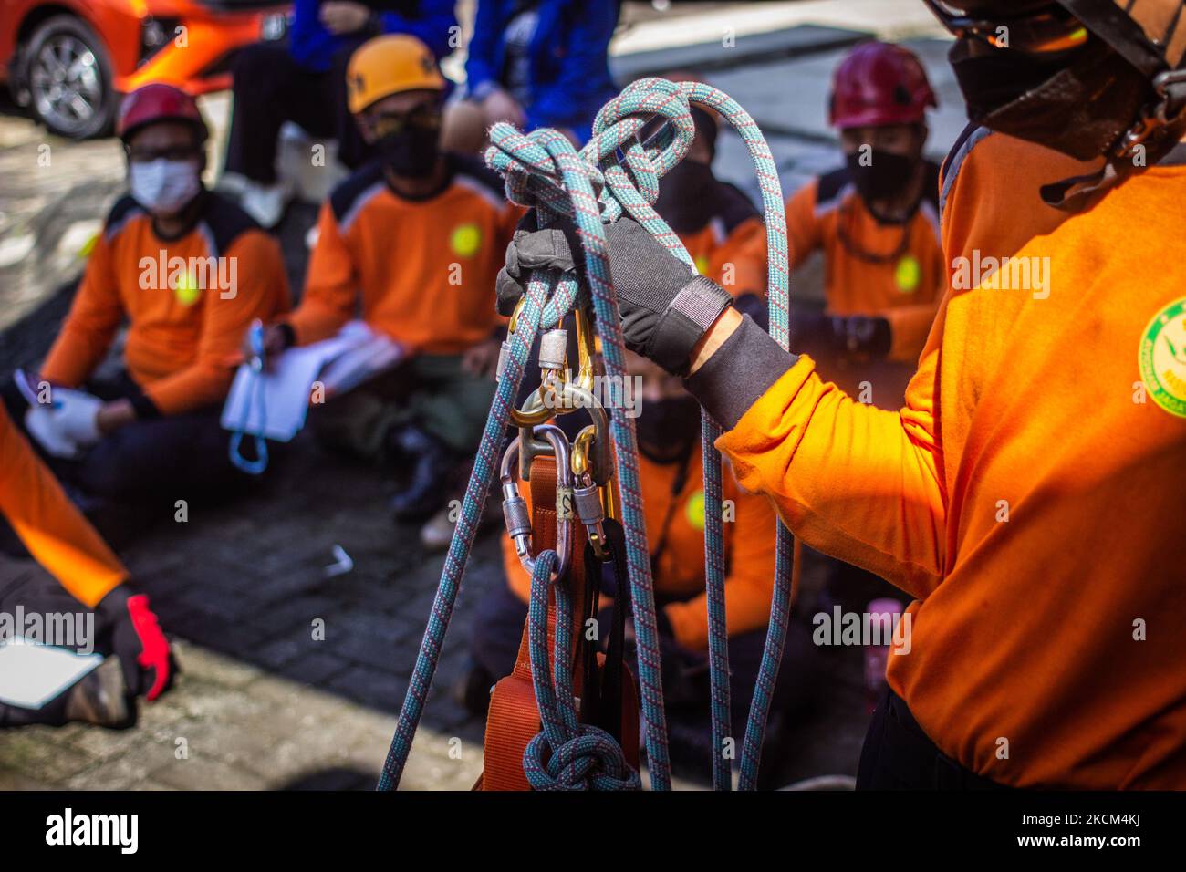 Personel of National Search and Rescue Agency (BASARNAS) rescue the ...