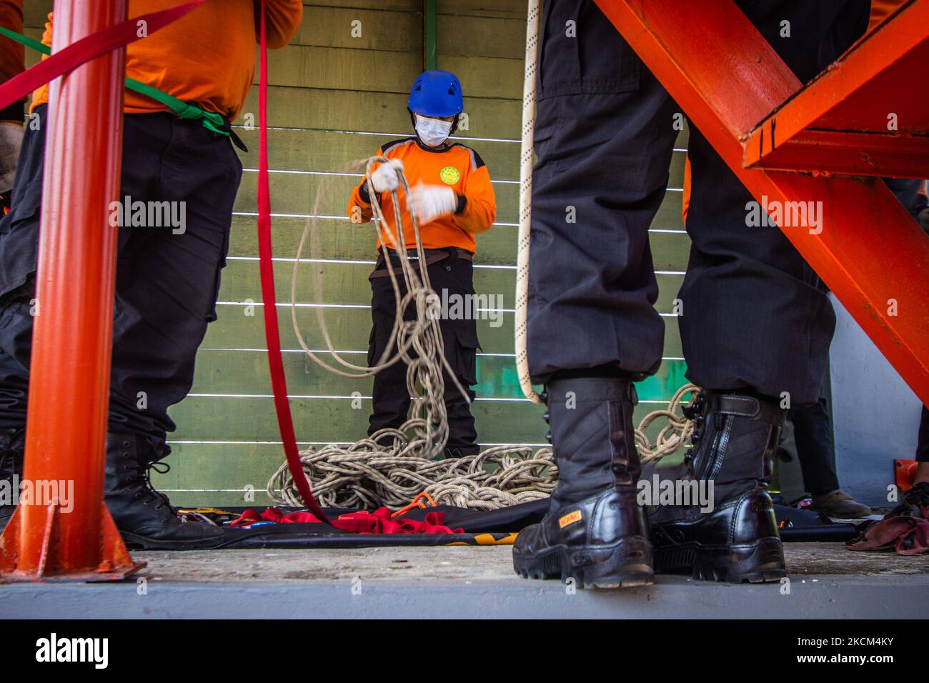 Personel of National Search and Rescue Agency (BASARNAS) rescue the ...