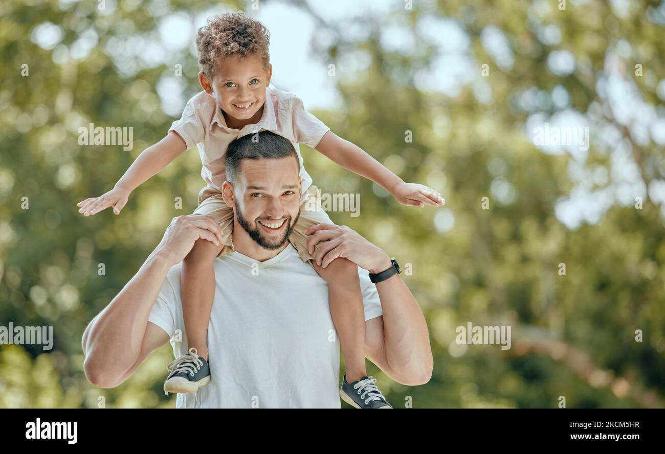 Family, happiness and nature park with dad carrying child on shoulders ...