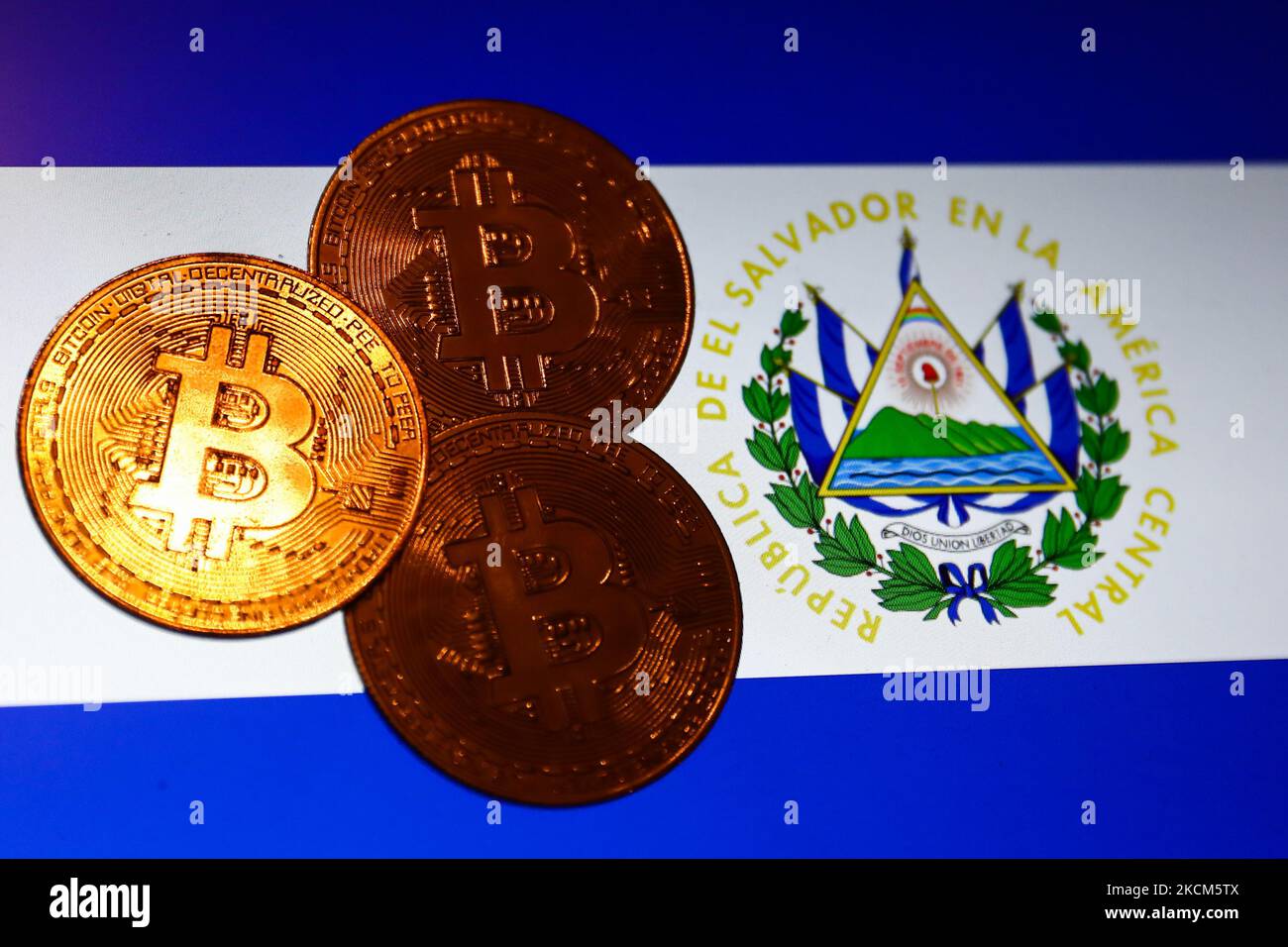 Representation of Bitcoin cryptocurrency and El Salvador flag displayed ...