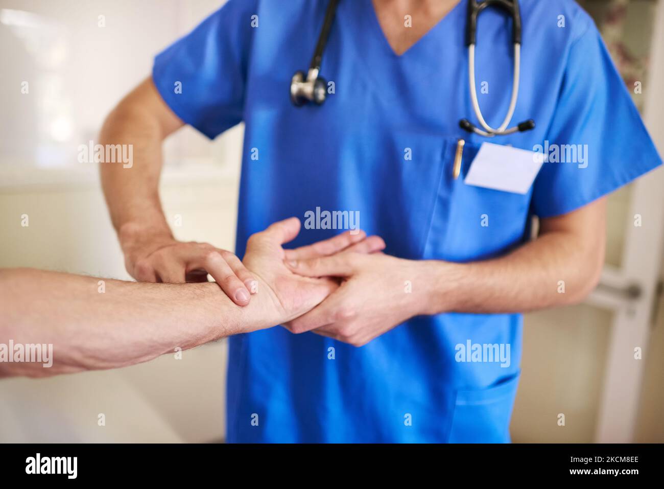 Healthy heart, healthy life. a young doctor monitoring his senior ...
