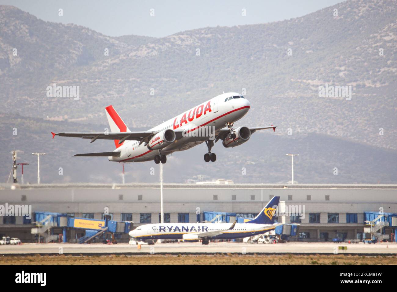 Lauda Europe low cost airline Airbus A320 airplane departs from Athens ...