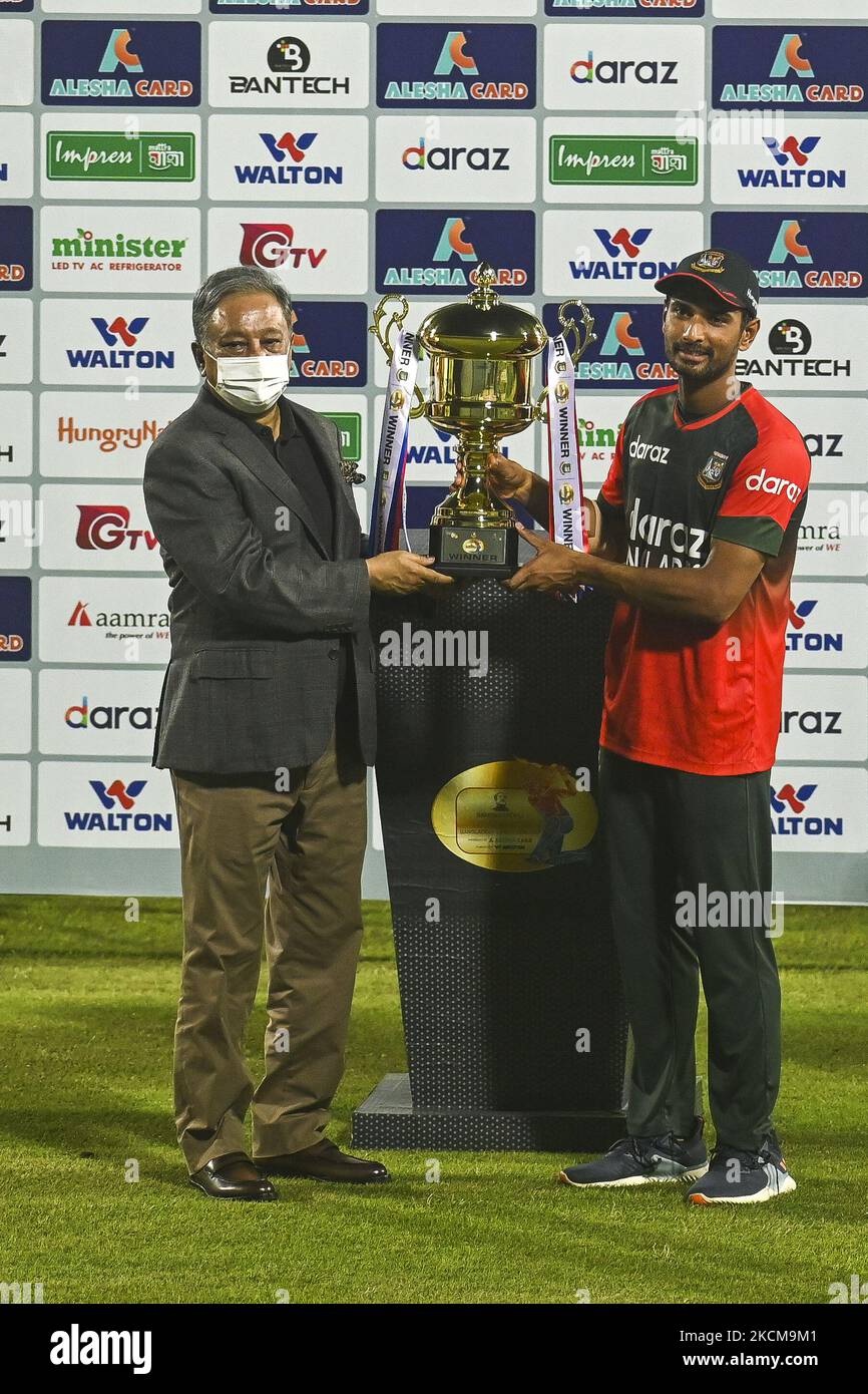 Bangladesh's captain Mahmudullah receives the series' trophy from ...