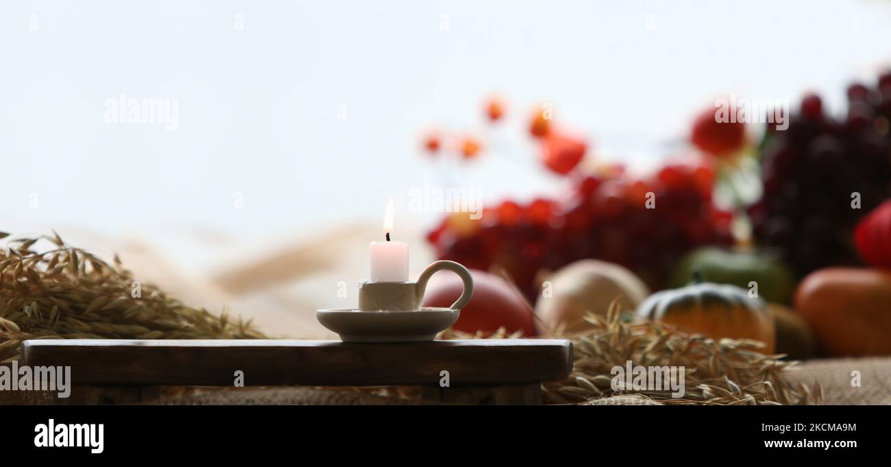 Church thanksgiving decoration and background with candles and fruits ...