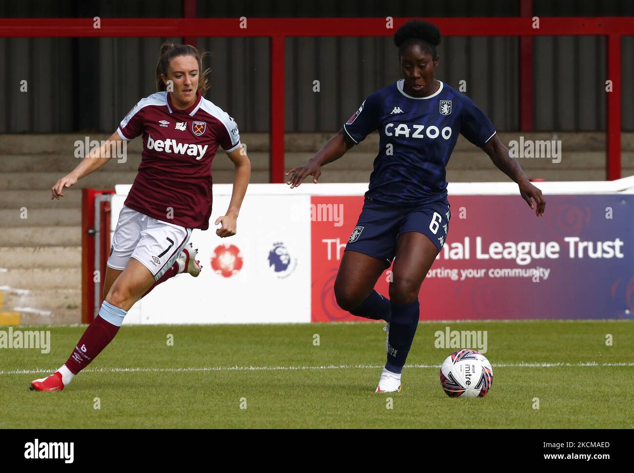 L-R Lisa Evans (on loan from Arsenal) of West Ham United WFC and Chloe ...