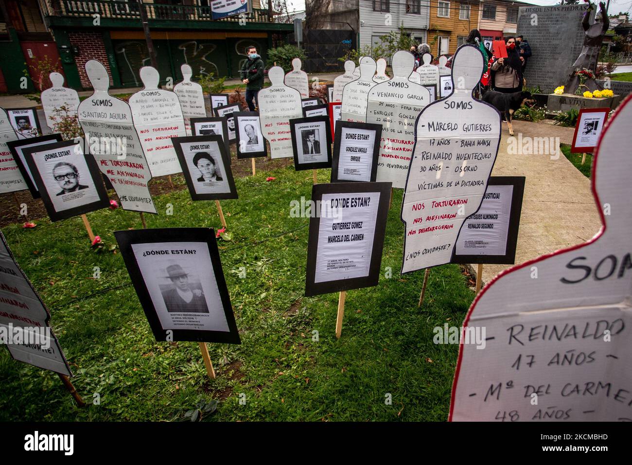Posters with the faces of the disappeared detainees. Relatives of ...