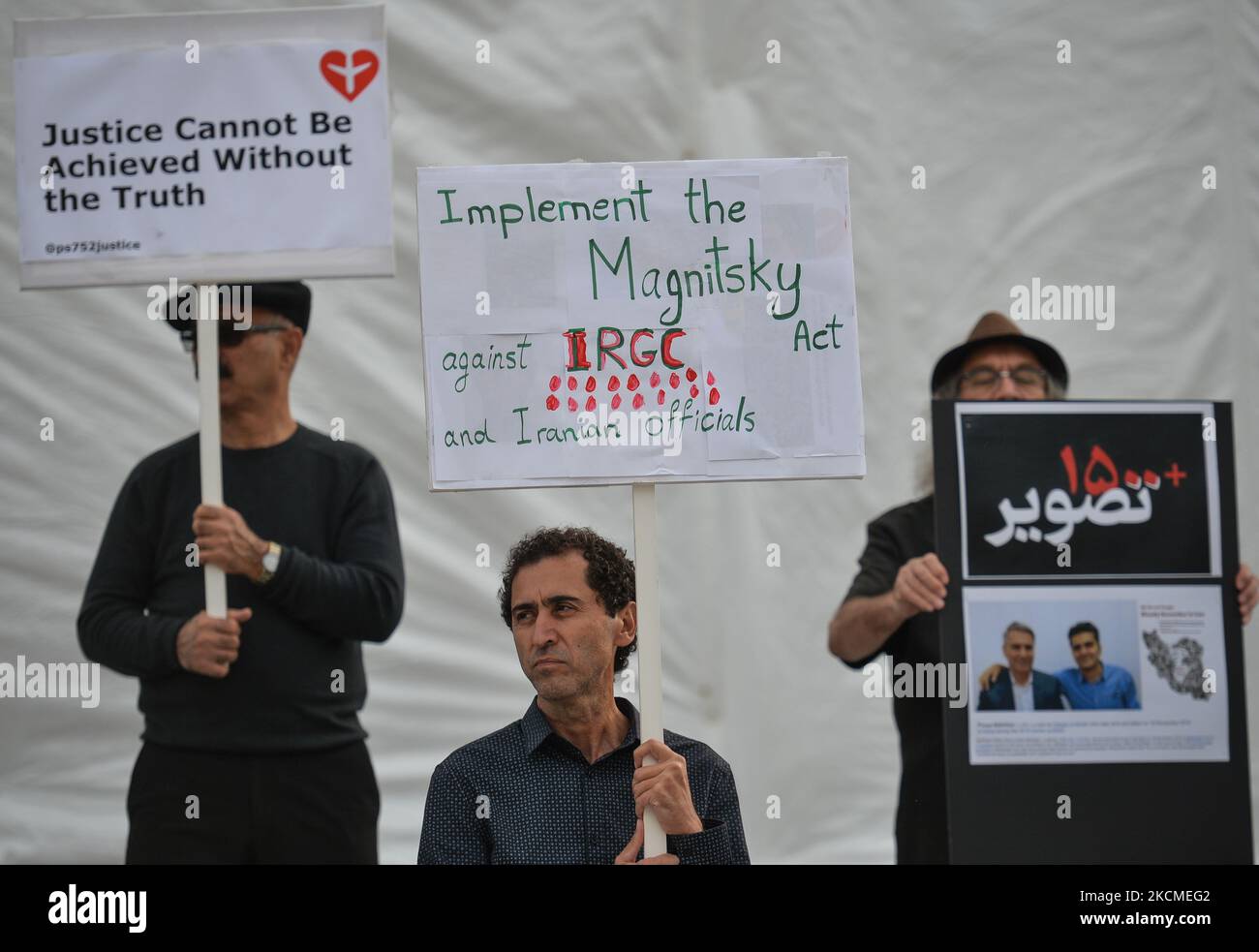 Members of the local Iranian diaspora, seen in front of the Alberta ...