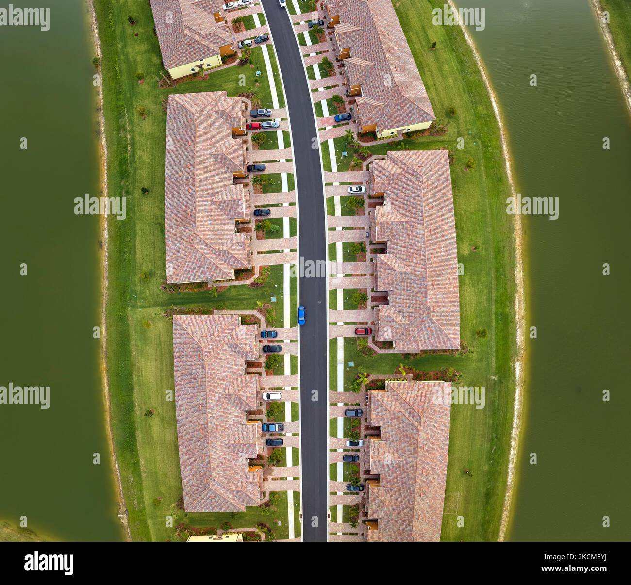 View from above of densely built residential houses in closed living ...