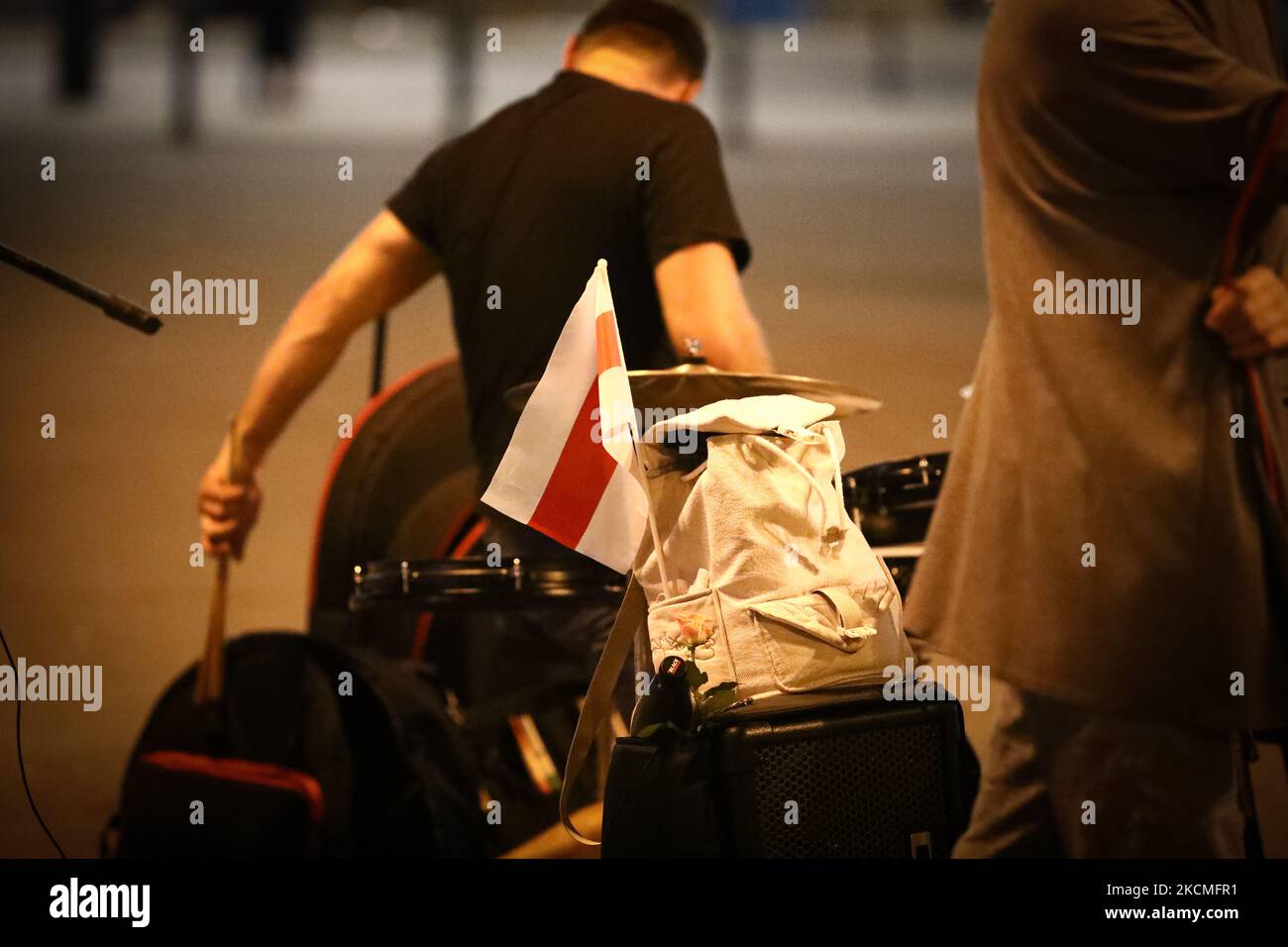 A white red white flag, a symbol of the Belarusian opposition is seen ...